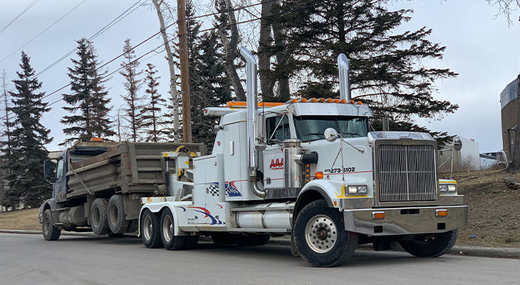 How To Pick The Right Trailer For Hauling Heavy Equipment | AAA Towing